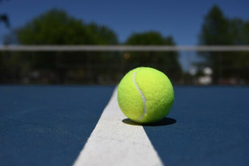 How to Master Tennis Topspin: A Beginner's Guide - TopspinPro