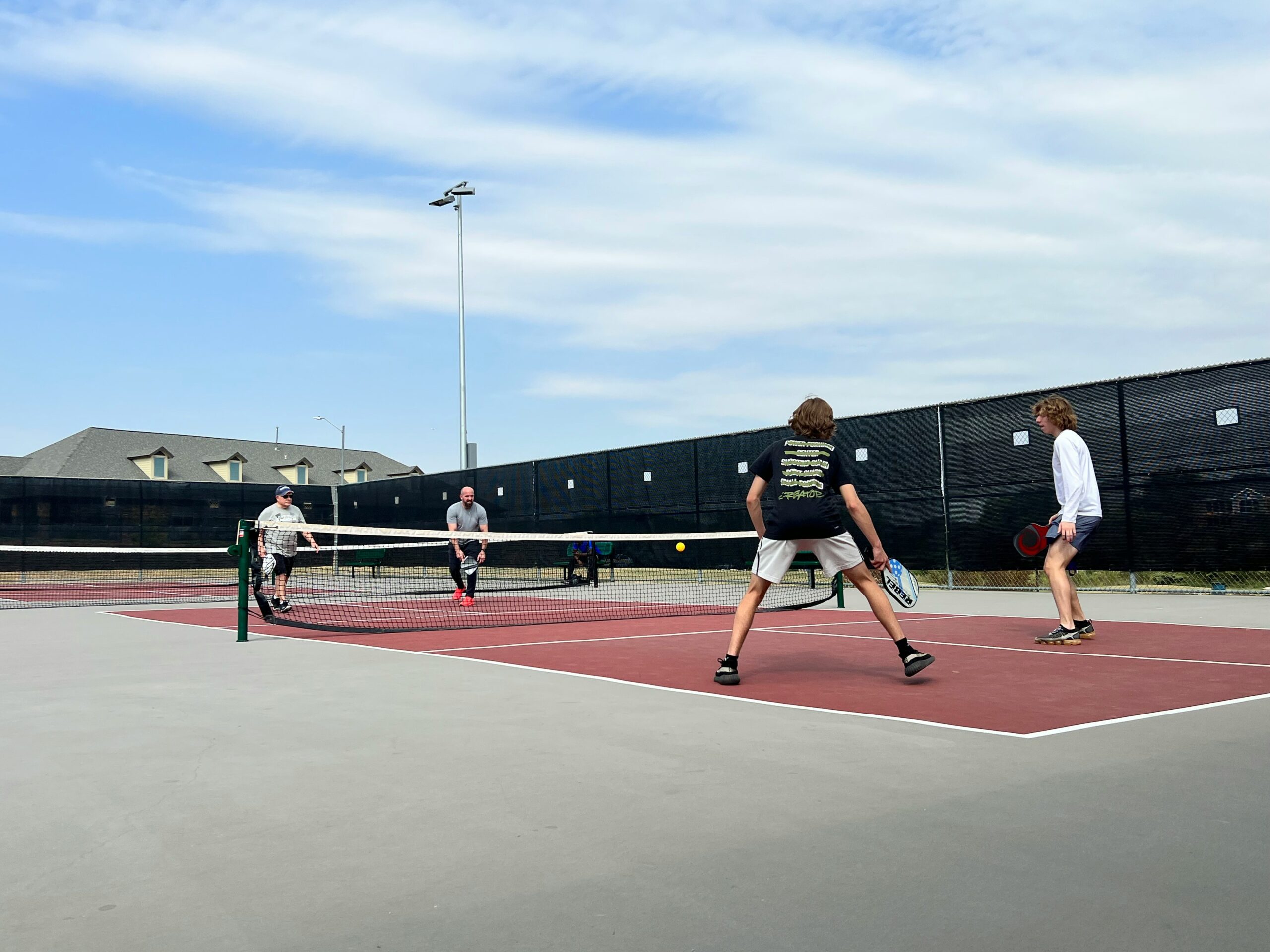 Should You Always Stay at the Kitchen Line in Pickleball? - TopspinPro